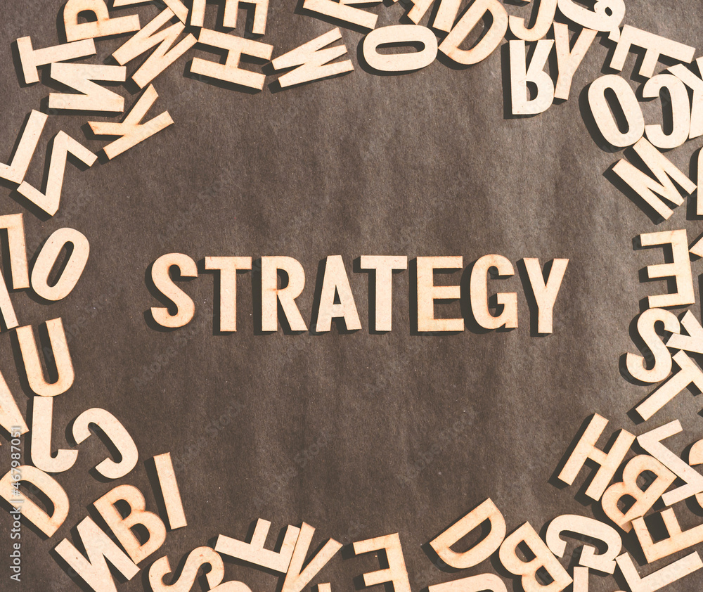 Strategy Word In Wooden Cube Alphabet Letters Top View On A rustic ...