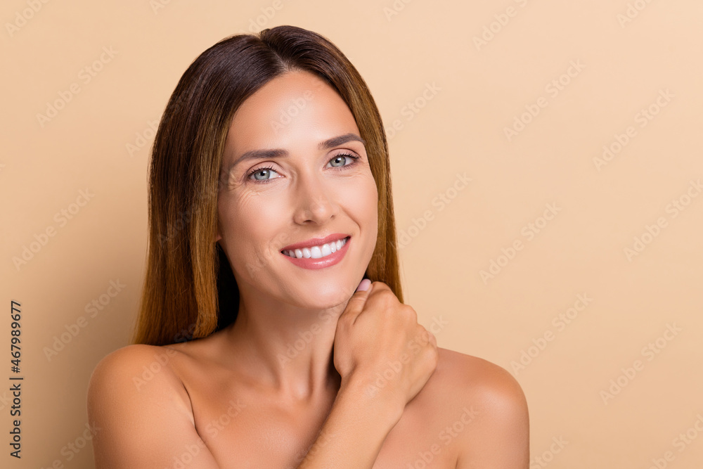 Portrait of attractive woman touching smooth silky flawless skin ...