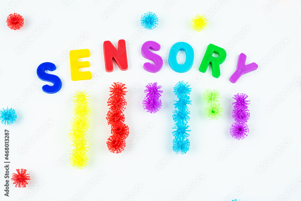 Sensory word and colorful balls that magically bunch. Sensory training ...
