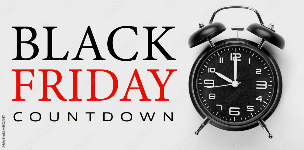 Alarm clock with text BLACK FRIDAY COUNTDOWN on light background Stock ...