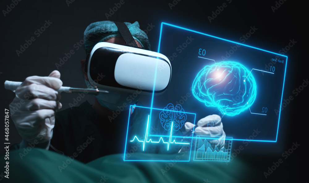 Doctor surgeon operating on ill patient brain using tools and computer ...