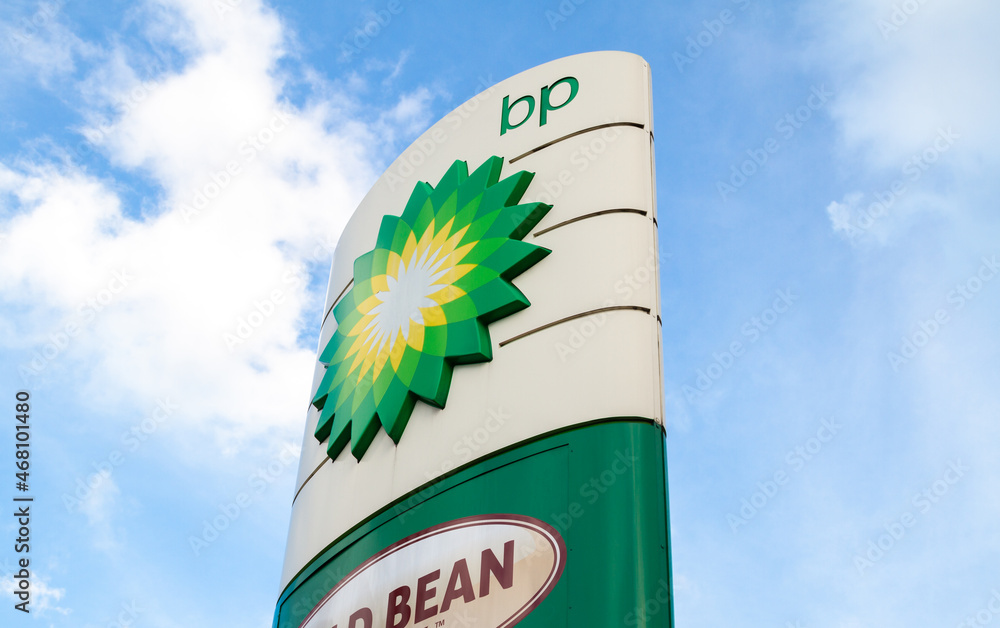 BP sign outside a petrol station. British Petroleum logo at filling gas ...