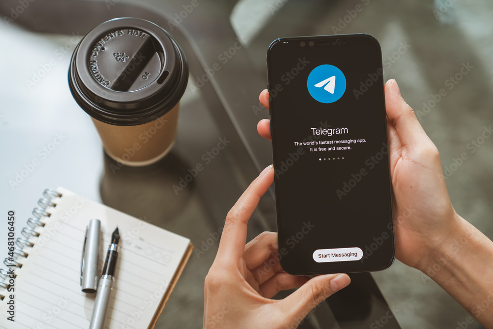 Bangkok, Thailand - November 09, 2021: Hand holding iPhone 12 Pro with ...