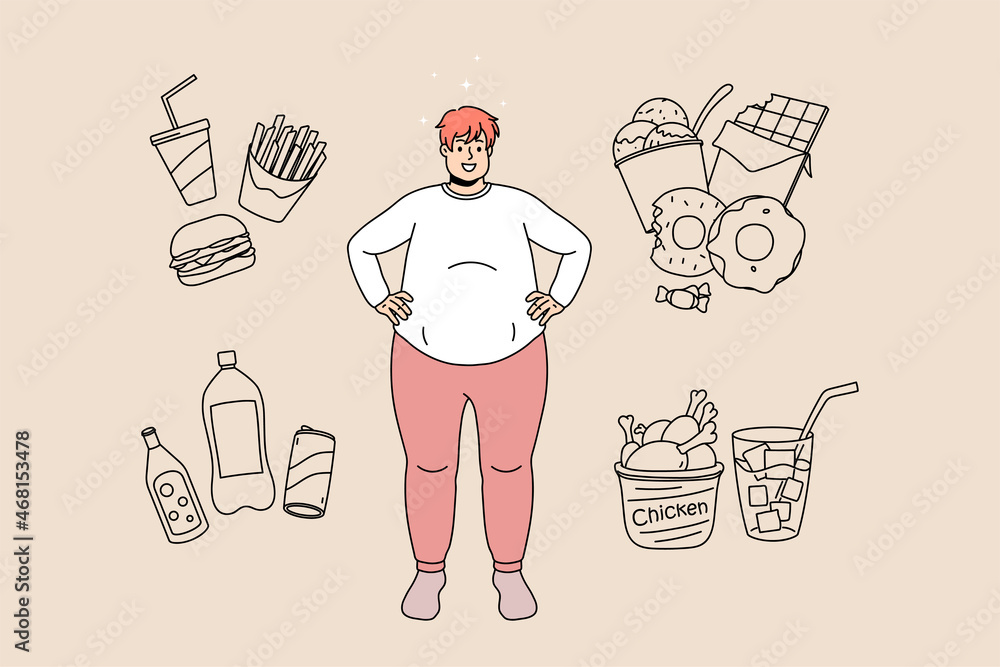 Smiling fat man surrounded by fast junk food and drinks. Happy ...