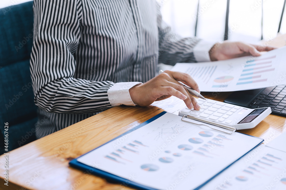 Businesswoman and accountant wearing formal attire Sit at work and use ...