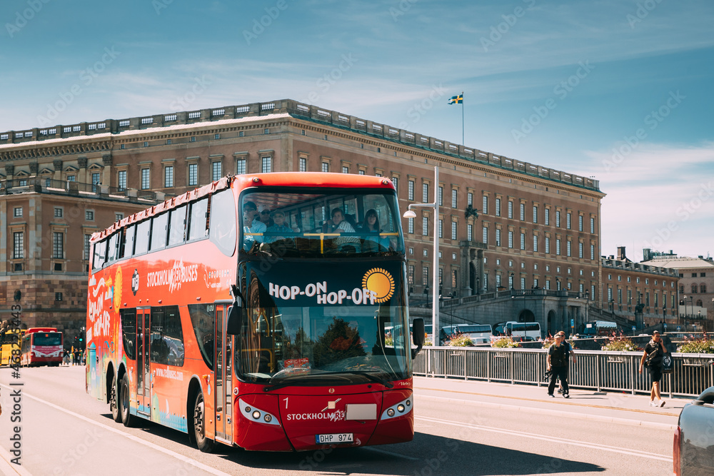 Stockholm, Sweden. Tourists People Ride In Red Hop On Hop Off Touristic ...