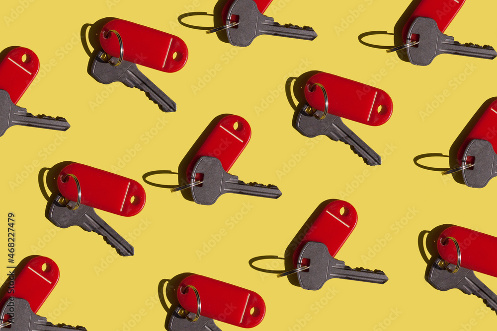 Bright yellow and red background with keys from the doors. Lots of keys ...