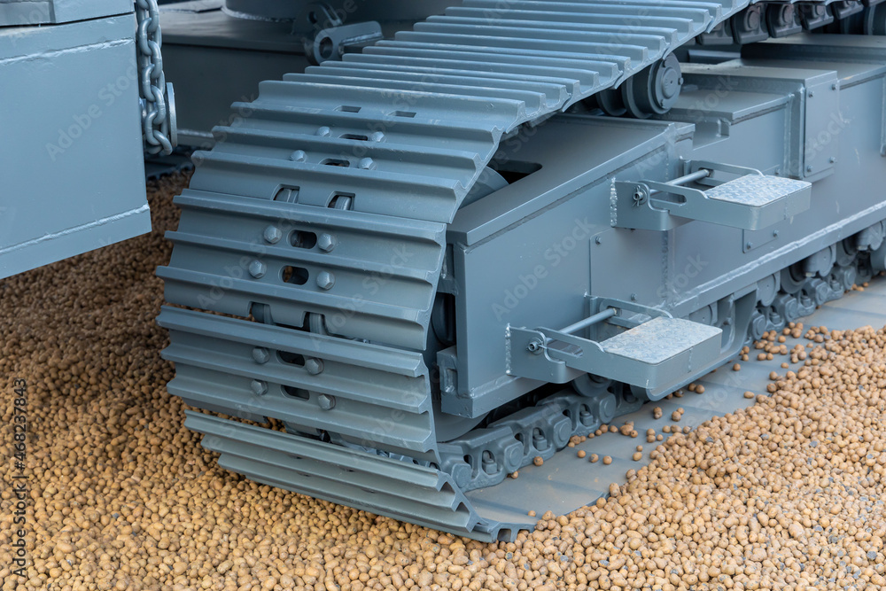 Crawler crane track shoe. Close-up of tractor tracks. Chassis of the ...