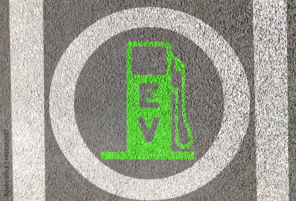 Electric vehicle charging station point marked on road symbol Stock ...