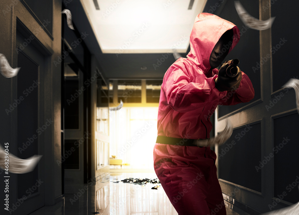 Criminal man in pink guard uniform pointing the shotgun Stock Photo ...