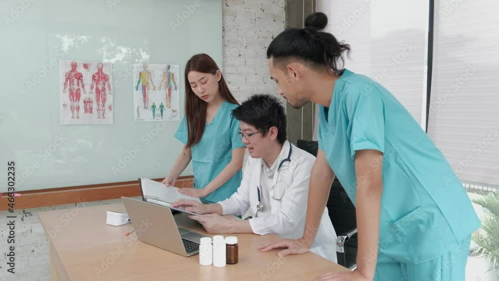 A group of Healthcare teamwork. Three young adult uniformed Asian ...