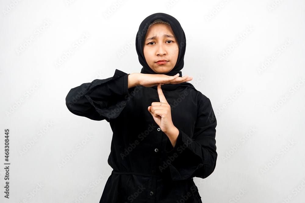 Beautiful asian young muslim woman with hand showing stop sign, silent ...