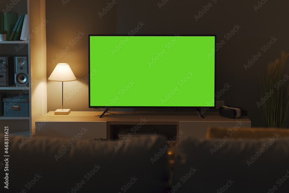 Television with horizontal green screen in the living room Stock Photo ...