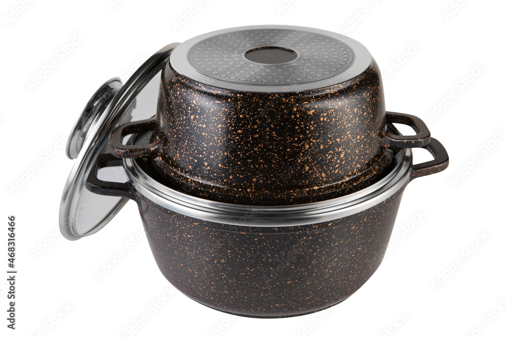two enamel pans are stacked on top of each other, one pot is upside ...