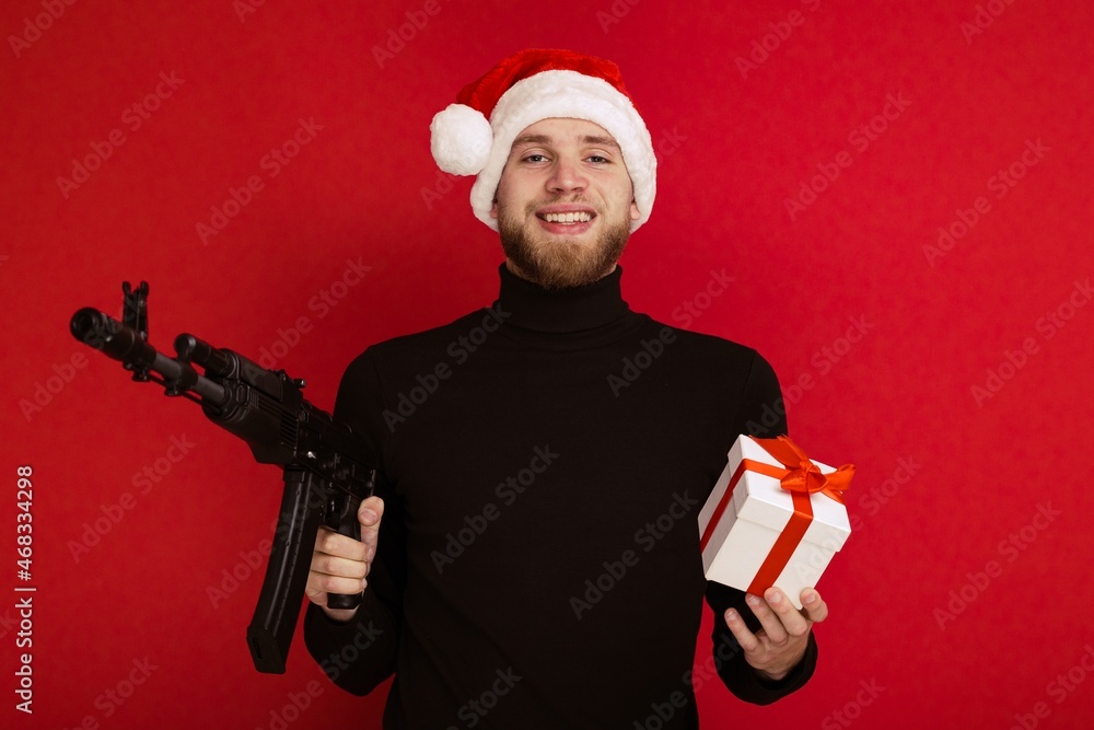 Bad Santa. A man in the image of Santa Claus with a machine gun and a ...
