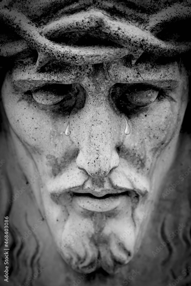 Fragment of an antique statue of Jesus Christ crown of thorns. Close up ...