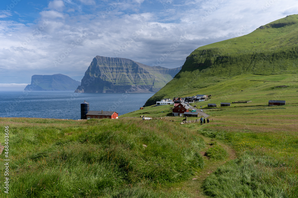 Beautiful aerial view of the Kallur Lighthouse in the Faroe Islands ...