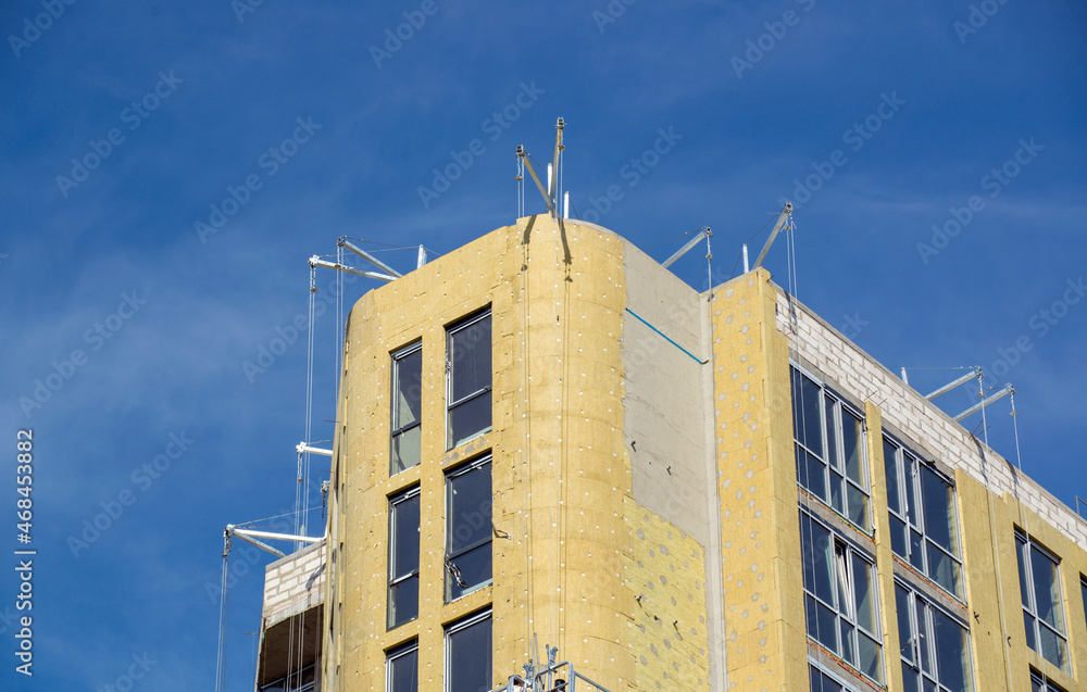 Building external wall thermal insulation with mineral wool. Exterior ...