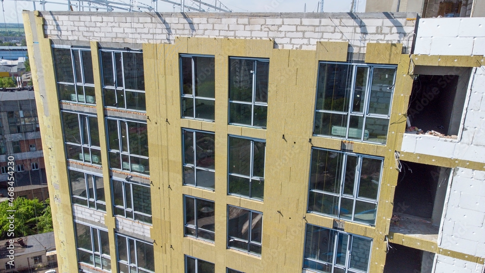 Building external wall thermal insulation with mineral wool. Exterior ...