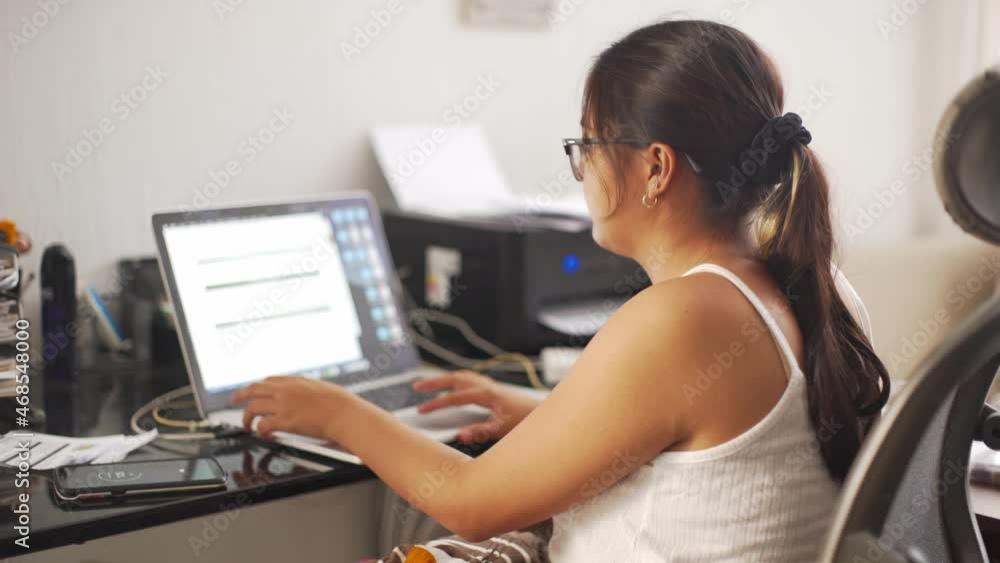 work at home concept. motherhood concept. young hispanic mother working ...