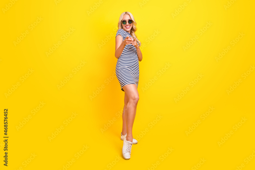 Full length body size photo woman wearing sunglass dress pointing ...