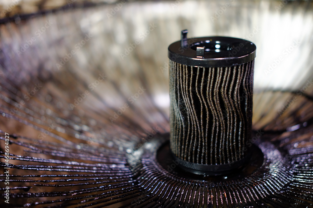 Car oil filter is very dirty and oil stains background Stock Photo ...