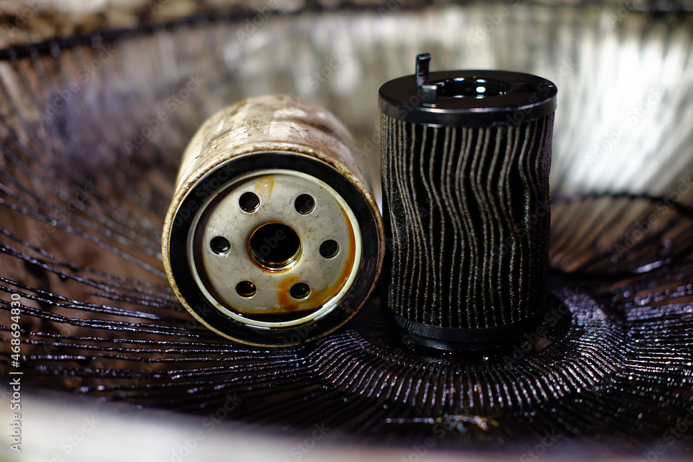 Car oil filter is very dirty and oil stains background Stock Photo ...