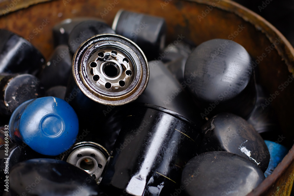 Car oil filter is very dirty and oil stains background Stock Photo ...