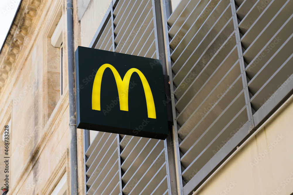 McDonald's sign brand and text m logo on Restaurant facade Exterior of ...