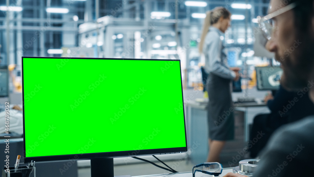 Car Factory Office: Caucasian Male Automotive Engineer Sitting at His ...