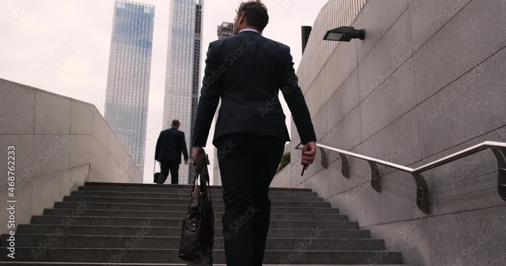 stylish man One person walking stepping going up the in stairs modern ...