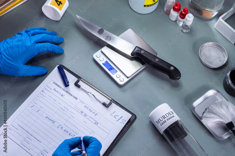 crime police weigh knife involved in murder, record data in crime lab ...