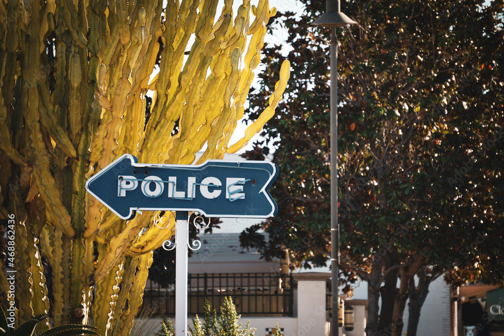 Vintage neon police station sign Stock Photo | Adobe Stock
