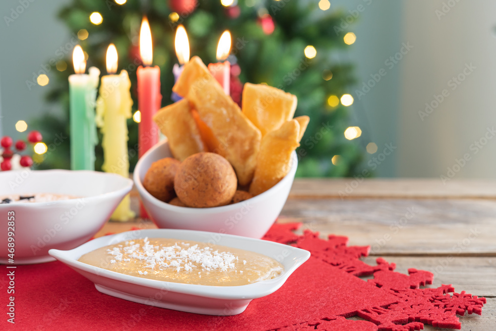 Candlelight Day. Typical Colombian food. Buñuelo, custard and flakes ...