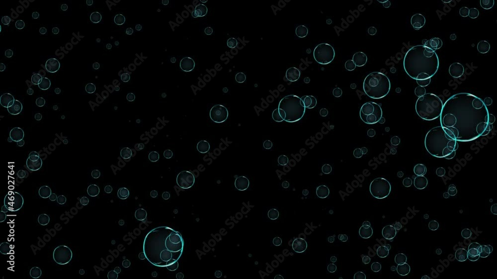Blue transparent bubbles move towards the camera from the depths of the ...