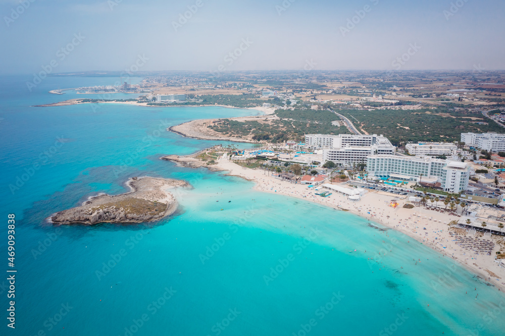 Aerial view of the most famous beaches in Cyprus - Nissi Beach. White ...