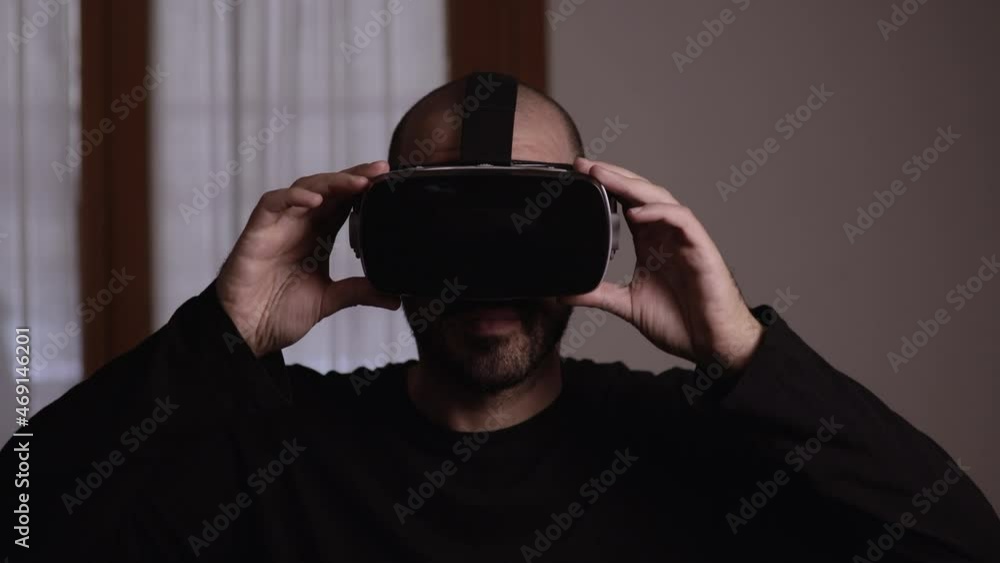 Man wears vr goggles and looks at world map in augmented reality ...