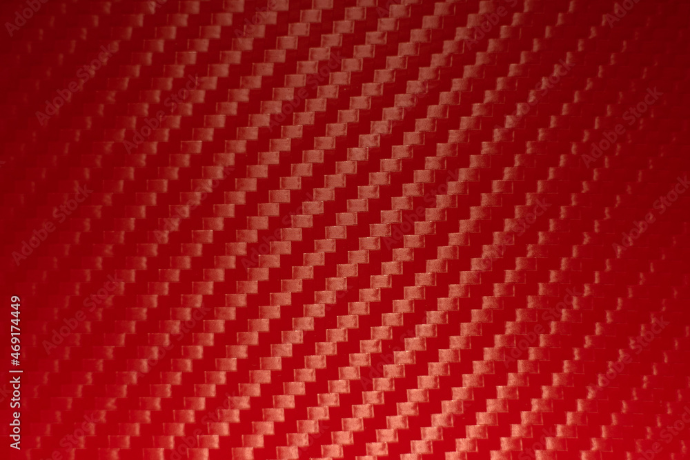 Photo of the texture of red carbon fiber. Sporty red background with ...