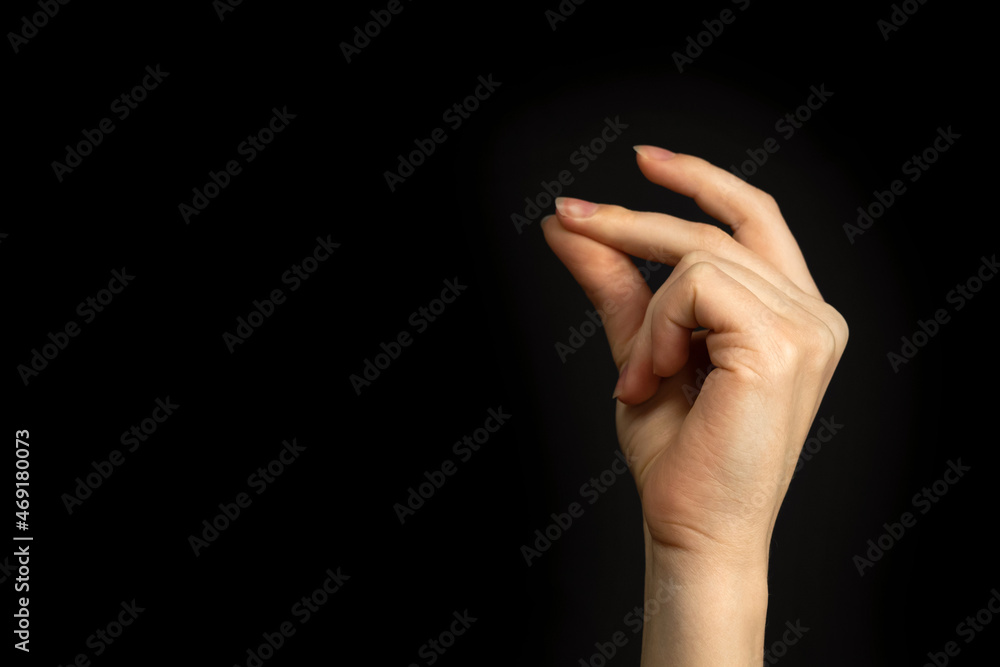 Hand gesture snapping fingers, easy sign and symbol on a black ...