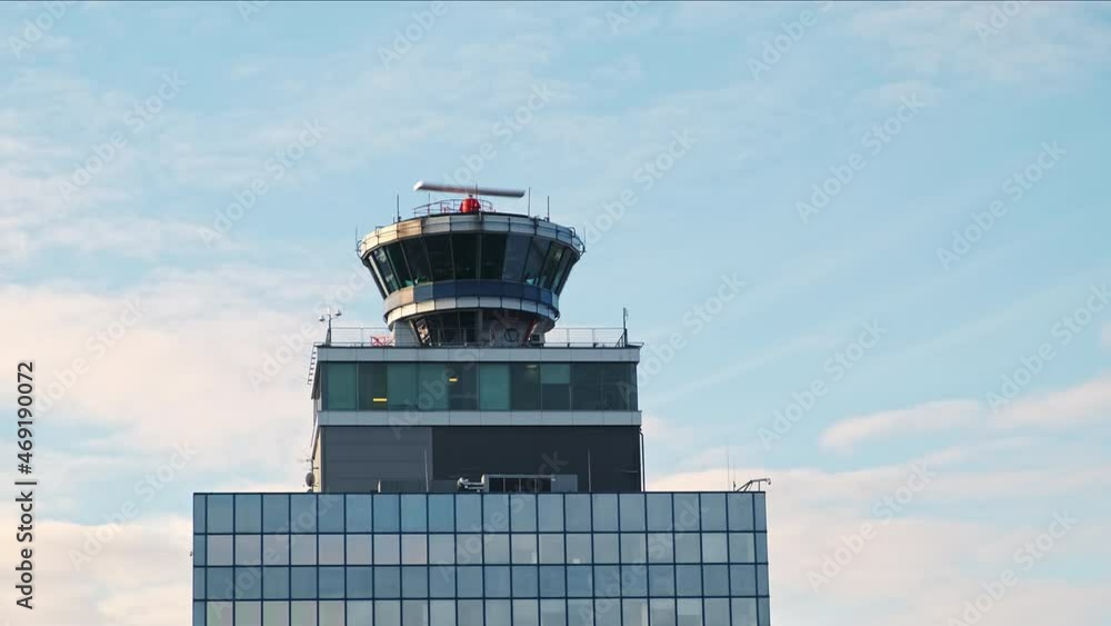 Functioning airport control tower with transparent booth. Air transport ...