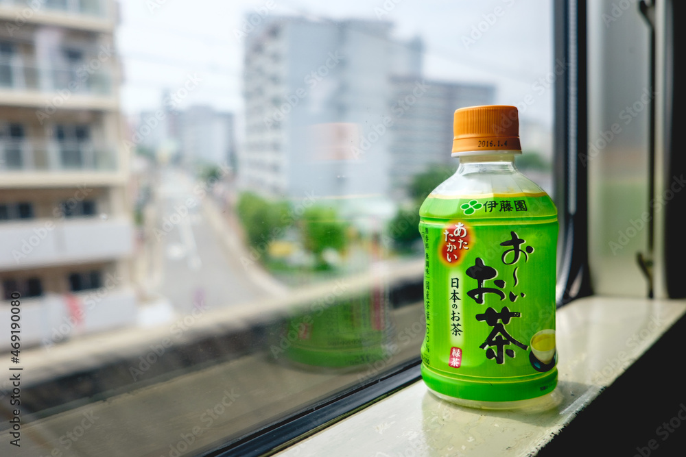 Osaka, Japan: ITO EN Oi Ocha Ryokucha green tea bottle at train window ...