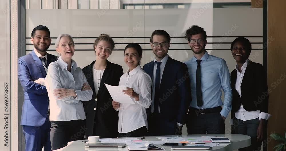 Seven multinational professional business team, diverse company members ...