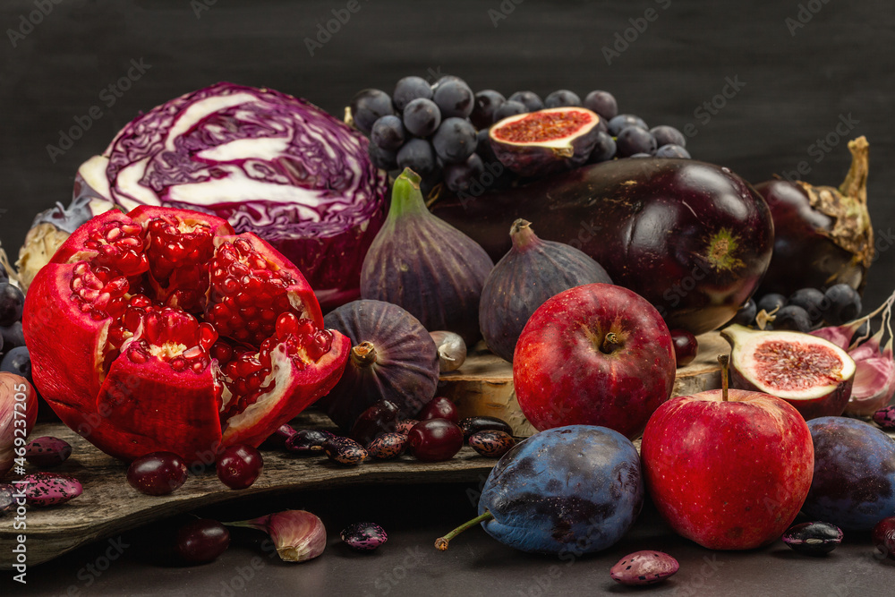 Blue, red and purple food. Culinary background of fruits and vegetables ...