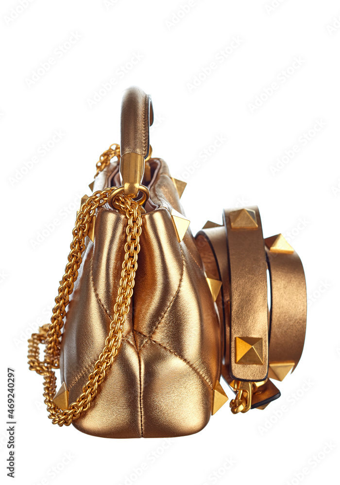 Handbag made of genuine leather in gold color, decorated with chains ...