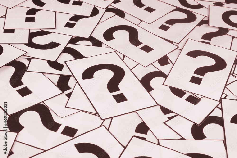 Question marks background. Many paper cards with question mark symbols ...