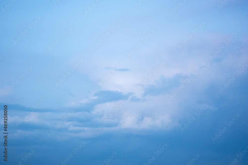 Blue sky with fluffy glowing pale blue clouds. Perfect beautiful ...