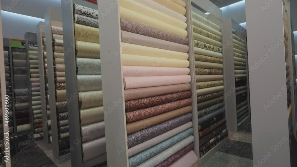 Stands with new samples. Rolls with wallpaper. Stands with rolls of ...
