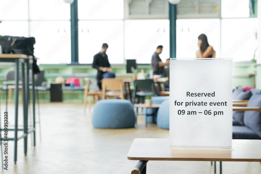 Selective focus of place and time reservation sign for private event ...