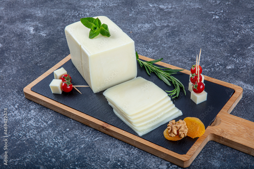 Kashar cheese or kashkaval cheese. Sliced Cheddar Cheese. gourmet ...