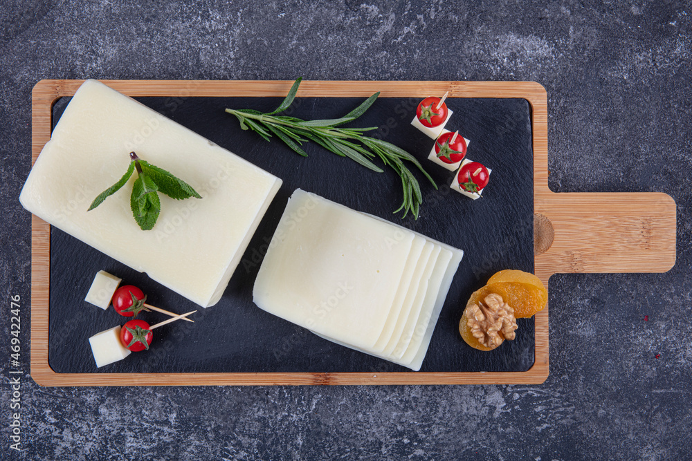 Kashar cheese or kashkaval cheese. Sliced Cheddar Cheese. gourmet ...